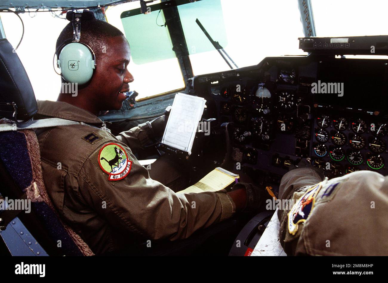 Aircraft Commander Captain Kirby Haynes of the 41st Airlift Squadron ...