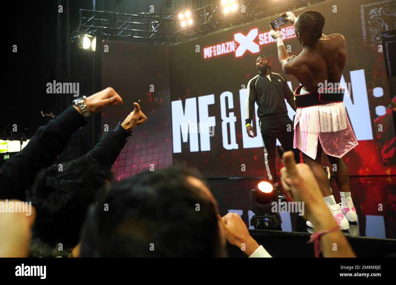 KSI takes a selfie with the crowd after victory in the cruiserweight ...