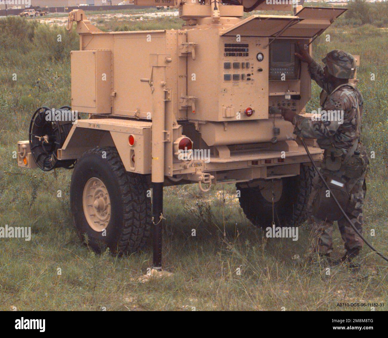 During a simulated tactical scenario, SPC Bryan A. Cook of HHB 1ST of ...