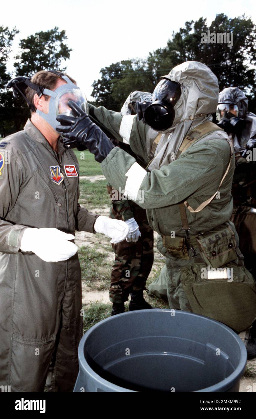 Captain (CAPT) Barboaur, USAF, 71st Fighter Squadron, gets assistance ...