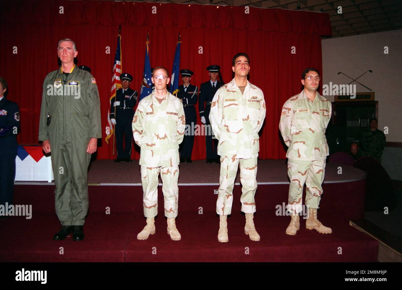 GEN. Walter Kross, Commander, Air Mobility Command poses with Purple ...