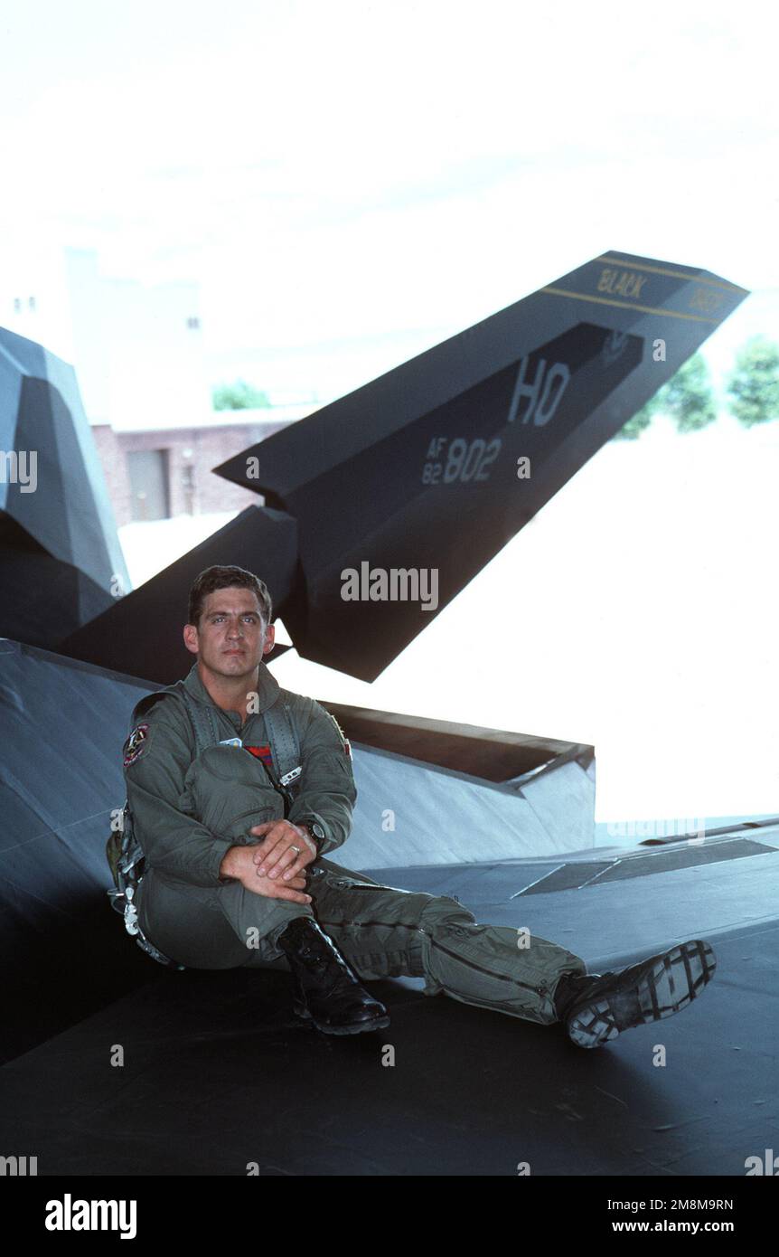 LT. COL. Joe Salata, 49th Fighter Wing CHIEF of Weapons and Training, sits on the wing of his F ...