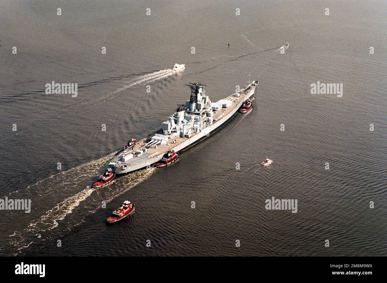 An aerial oblique starboard quarter view of the battleship WISCONSIN ...