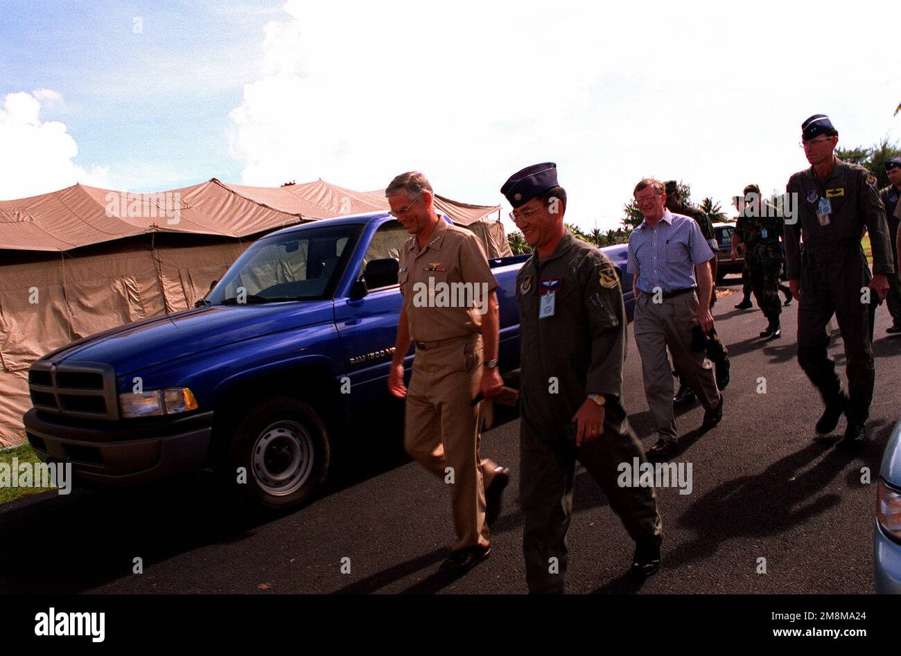 LT. COL. Kim, commander of the Air Transportable Hospital, accompanies ...