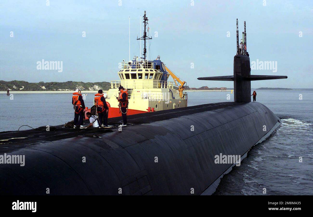 Crew members on board the US Navy's nuclear powered ballistic submarine ...