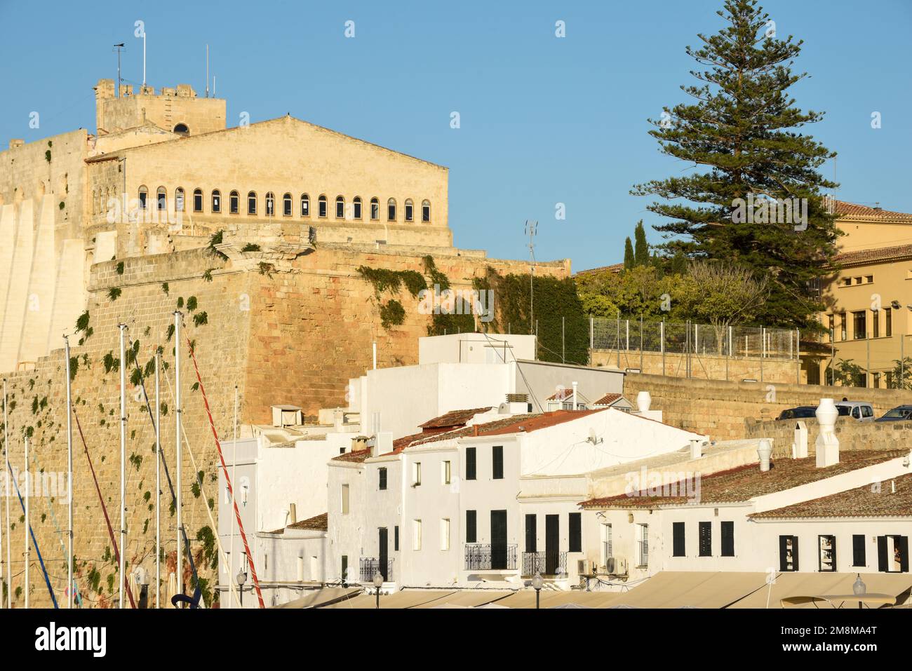 Low angle view of historic port town in menorca Stock Photo - Alamy