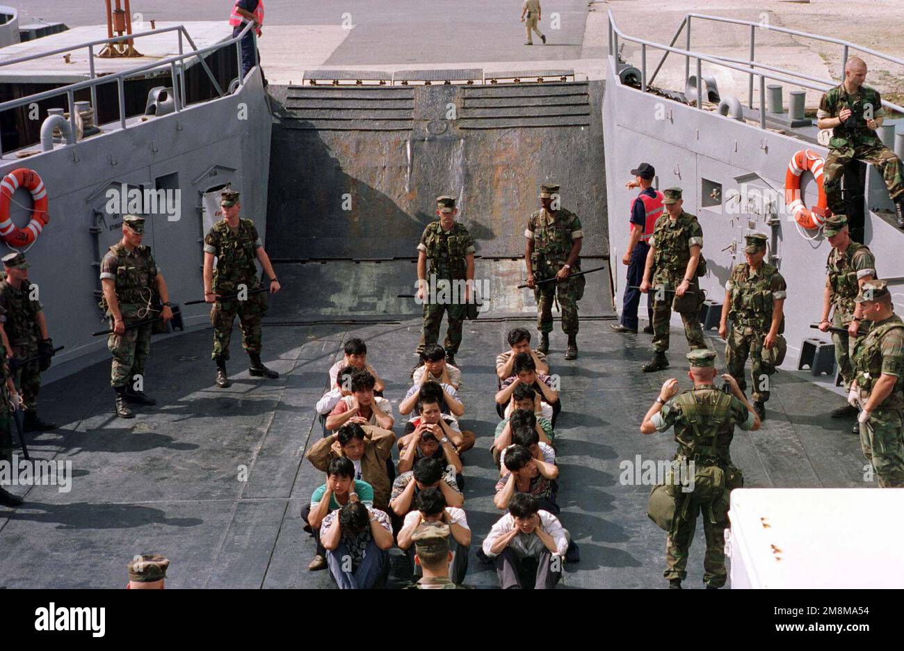 Marines of 1ST Platoon, Kilo Company, 3rd Battalion, 8th Marines, watch ...