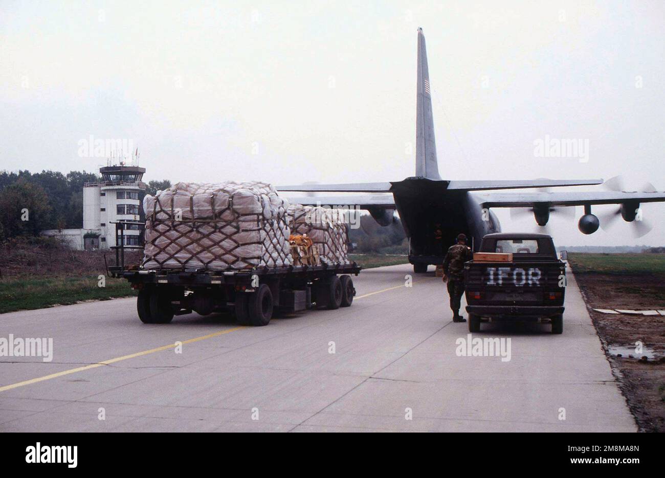4100th Group Provisional (USAF) personnel wait to offload three ...