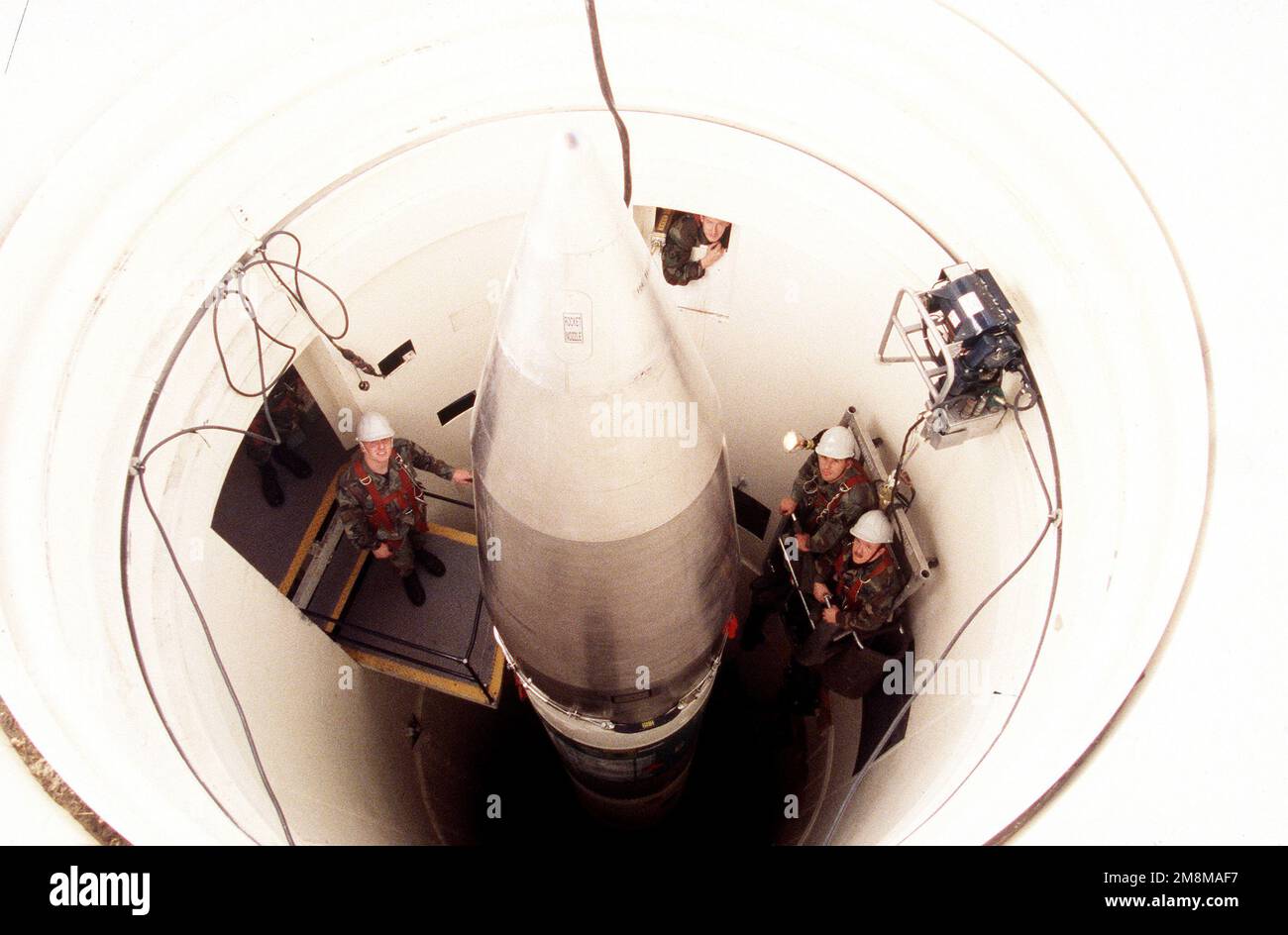 Missile Maintenance Technicians from the 90th MXS/LSS stand at the ...