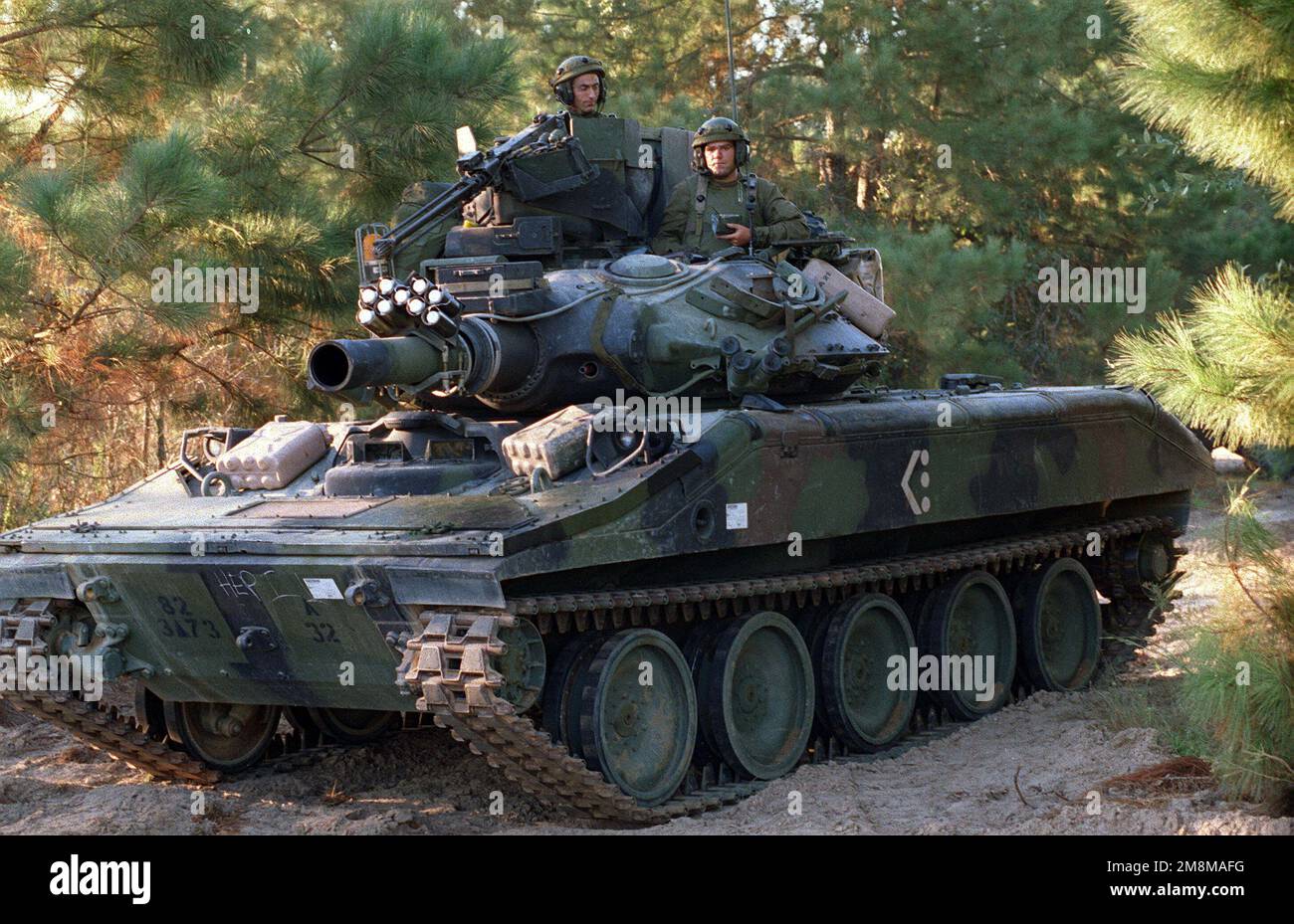 An Armored Crew from the 82nd Airborne Division, driving a M551 ...