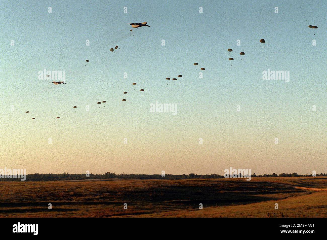 The sky rains paratroopers as soldier from the 82nd Airborne Division ...