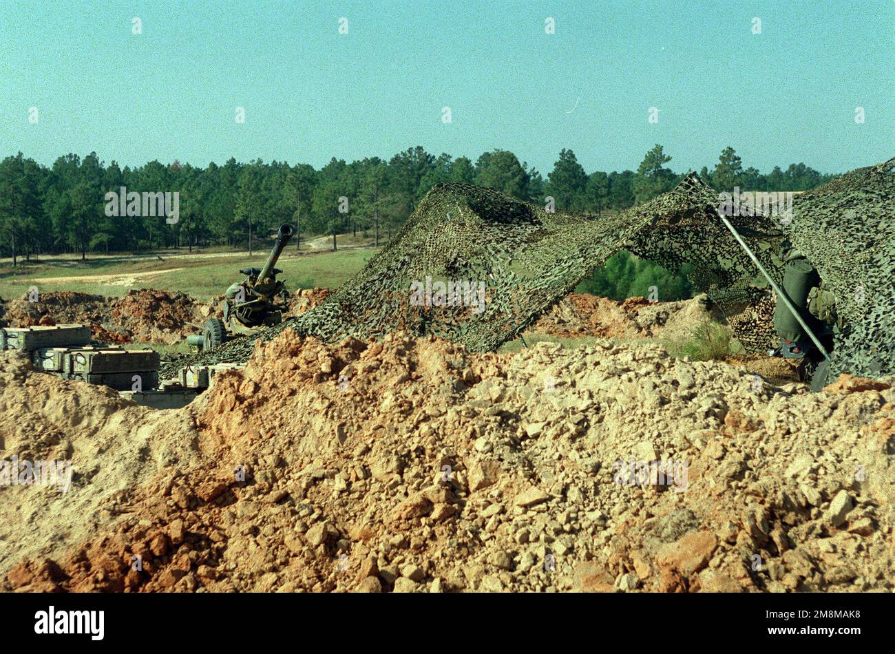 An Artillery Battery of the 82nd Airborne Division partially hidden ...