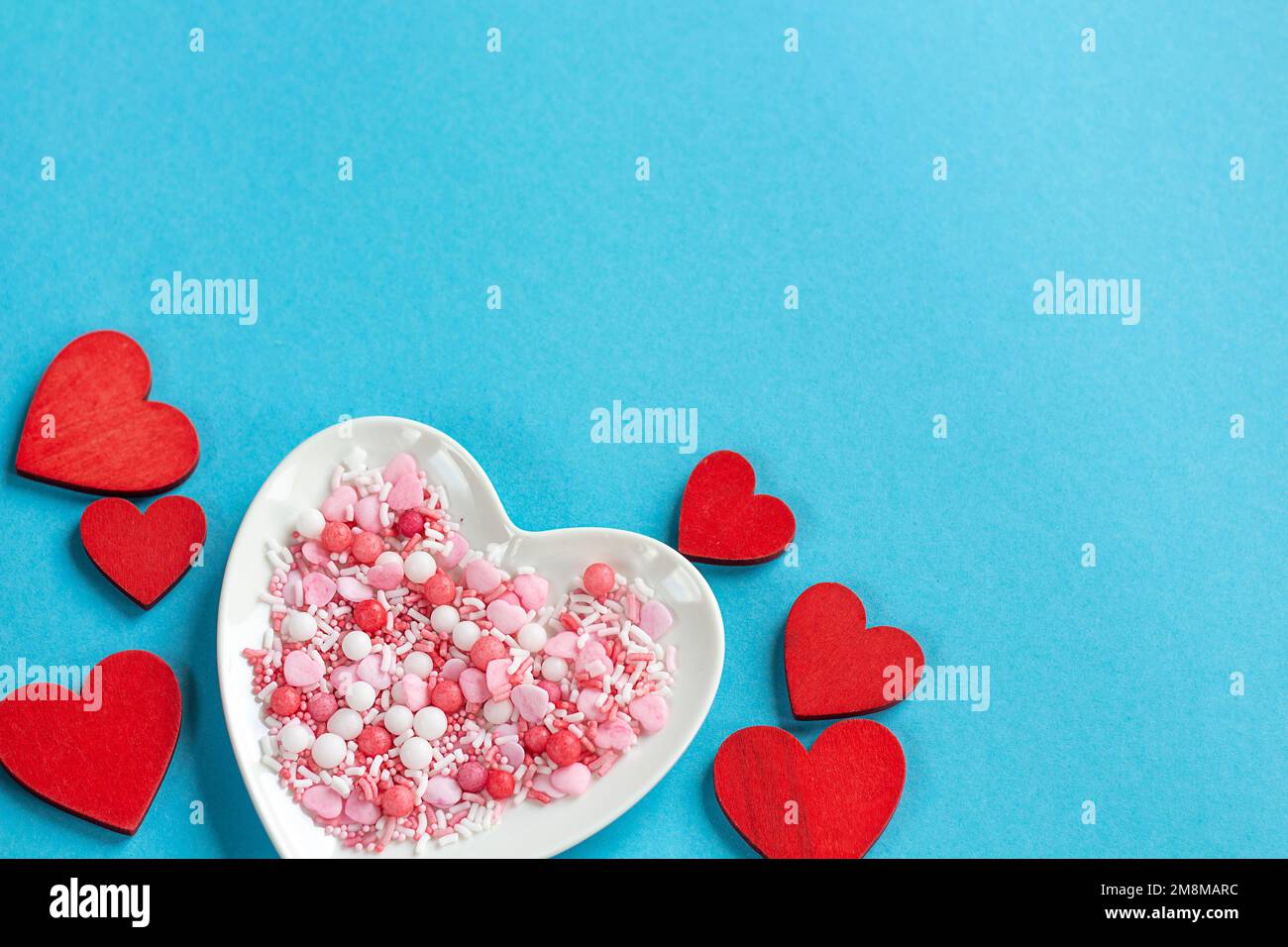 for Valentine's Day with sweets. cookies on a blue background. view ...