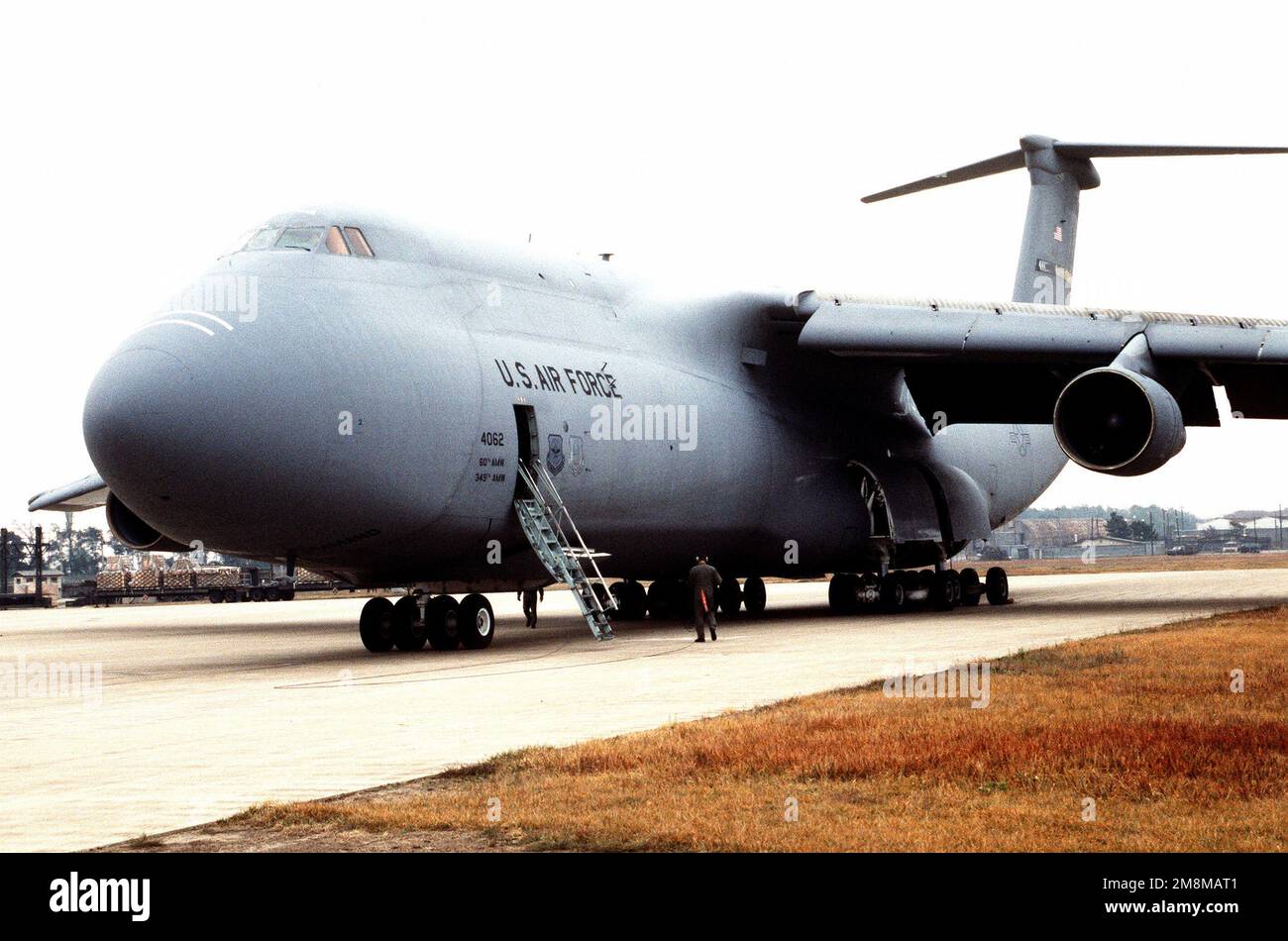 A close-up view of a C-5 Galaxy aircraft with the stairs in place ready ...