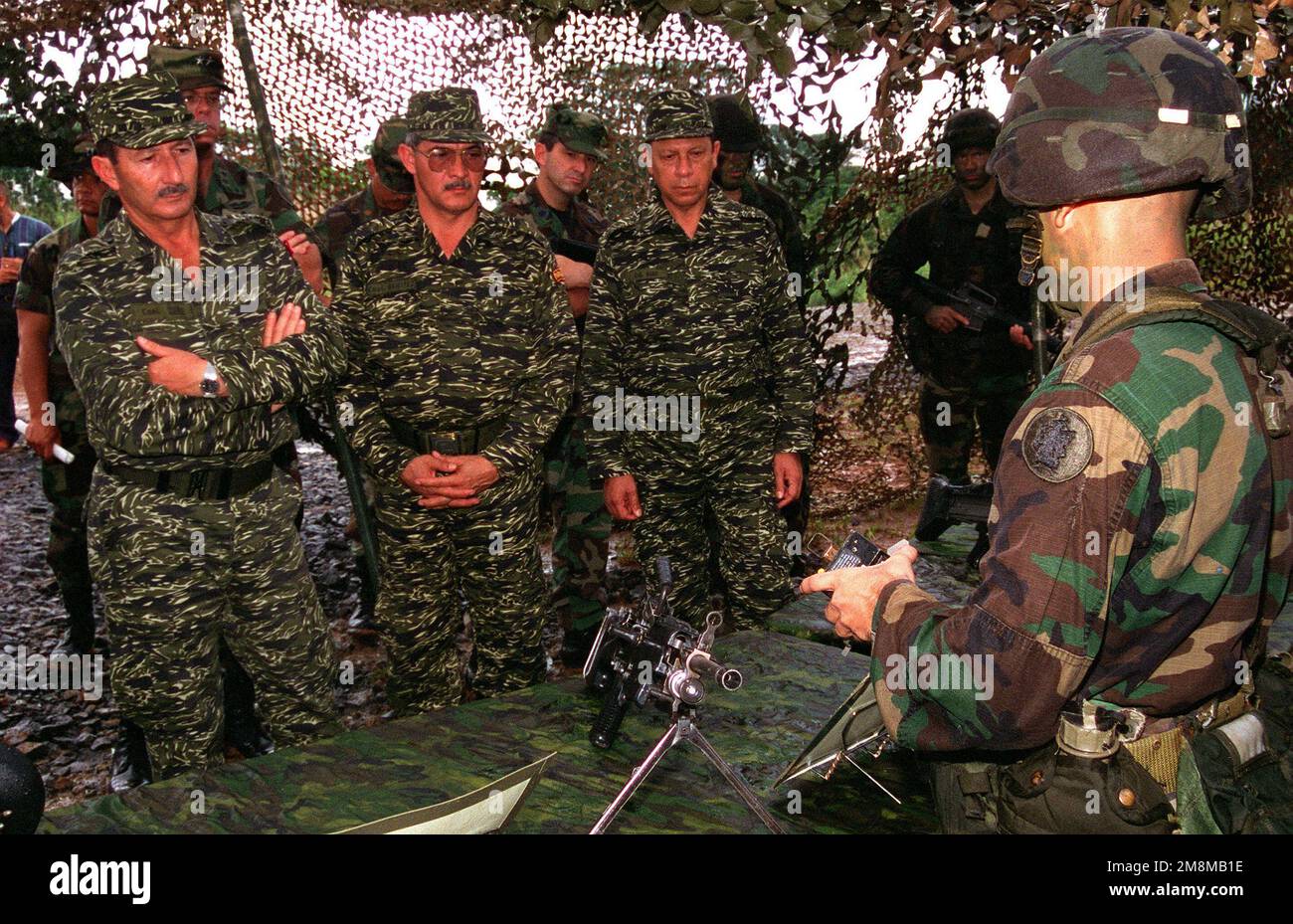 A member of Charlie Company, 5/87th Infantry Battalion (Light) gives an ...
