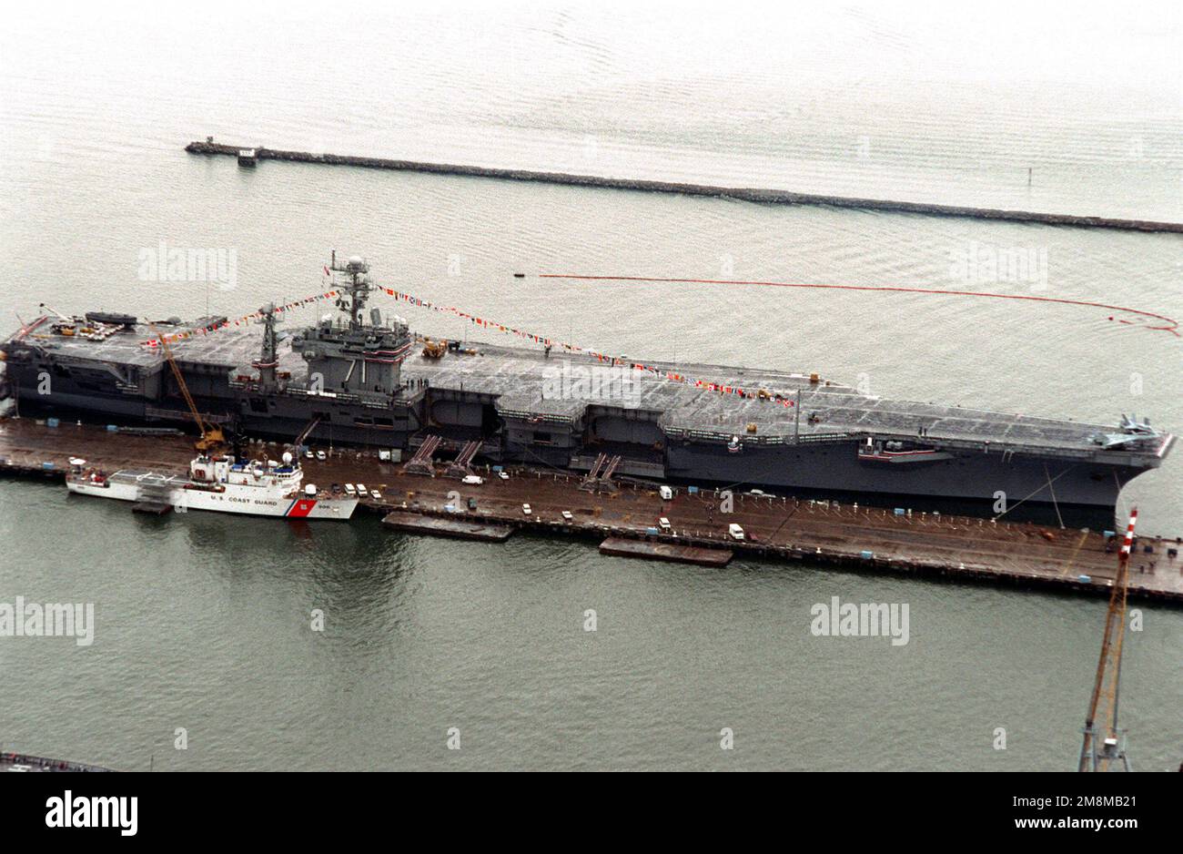 Aerial starboard side view of the nuclear-powered aircraft carrier USS THEODORE ROOSEVELT (CVN ...