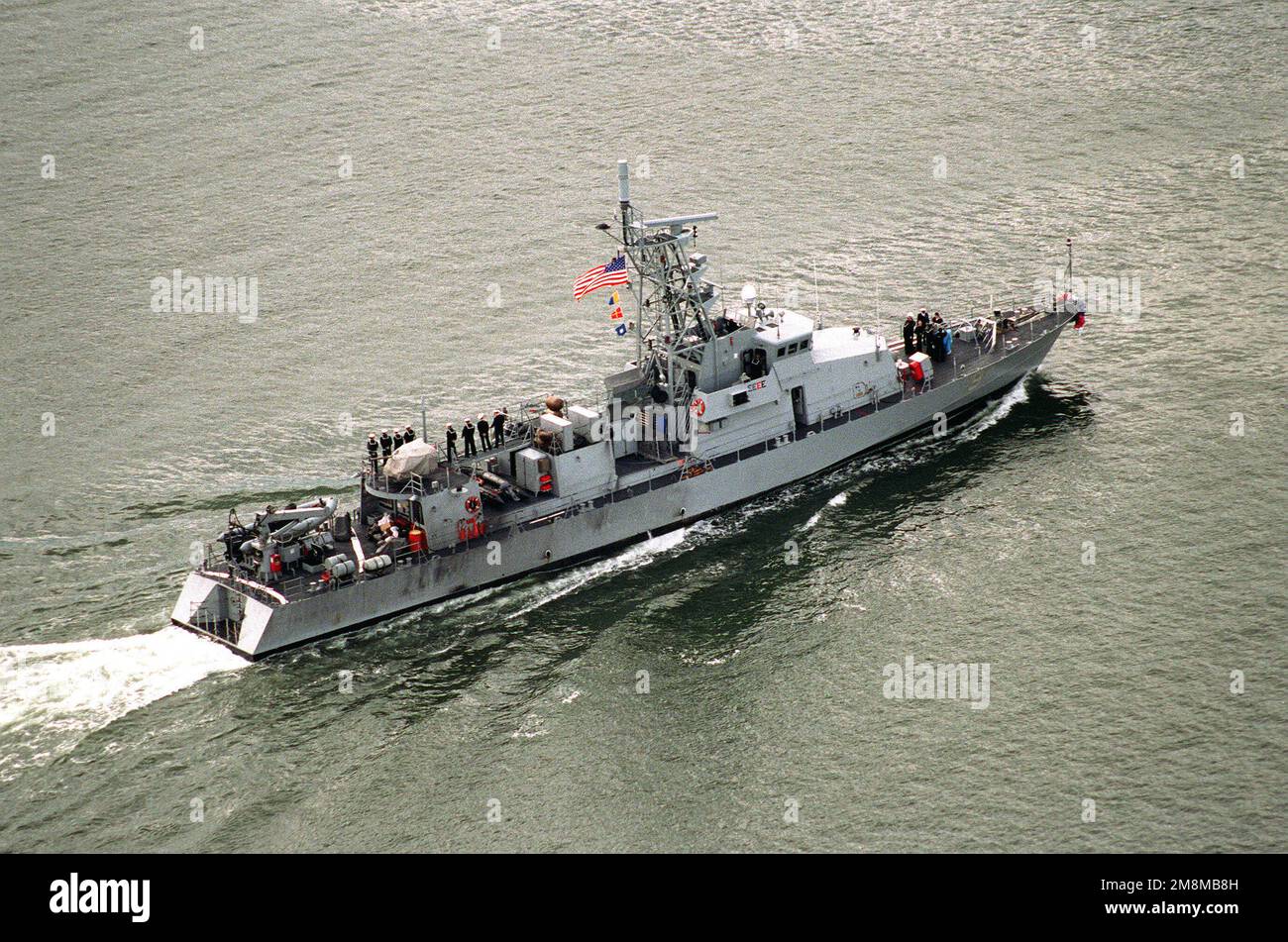 An aerial starboard quarter view of the coastal patrol craft USS ...