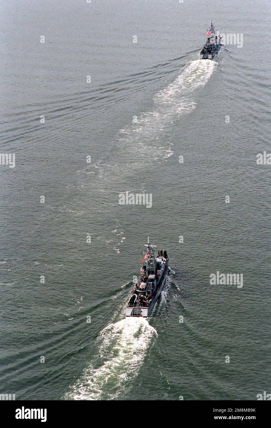 Aerial stern quarter view of the coastal patrol craft USS CHINOOK (PC-9 ...