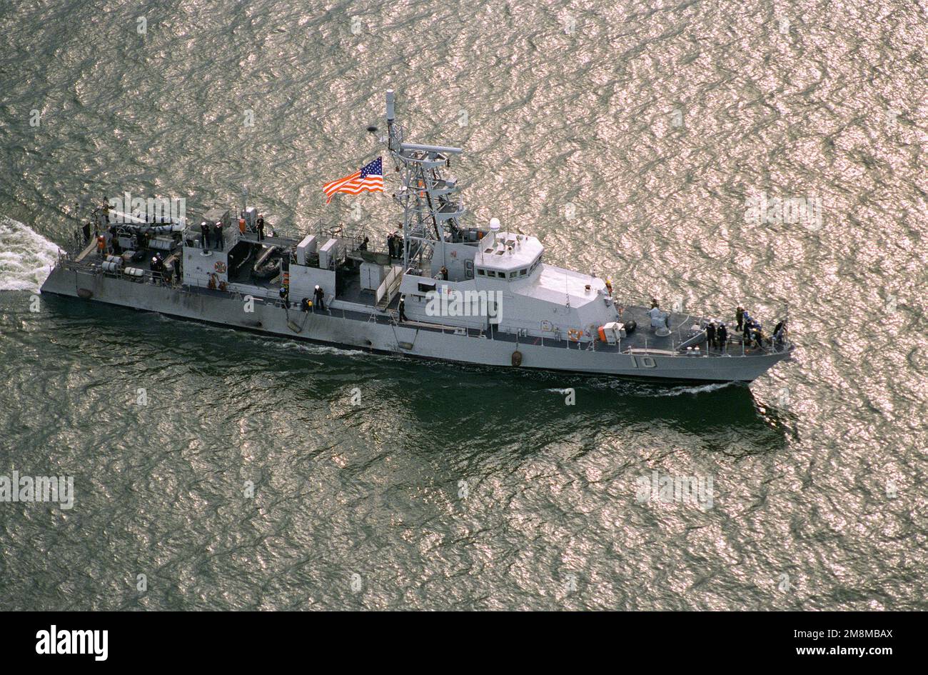 Aerial starboard side view of the coastal patrol craft USS FIREBOLT (PC ...