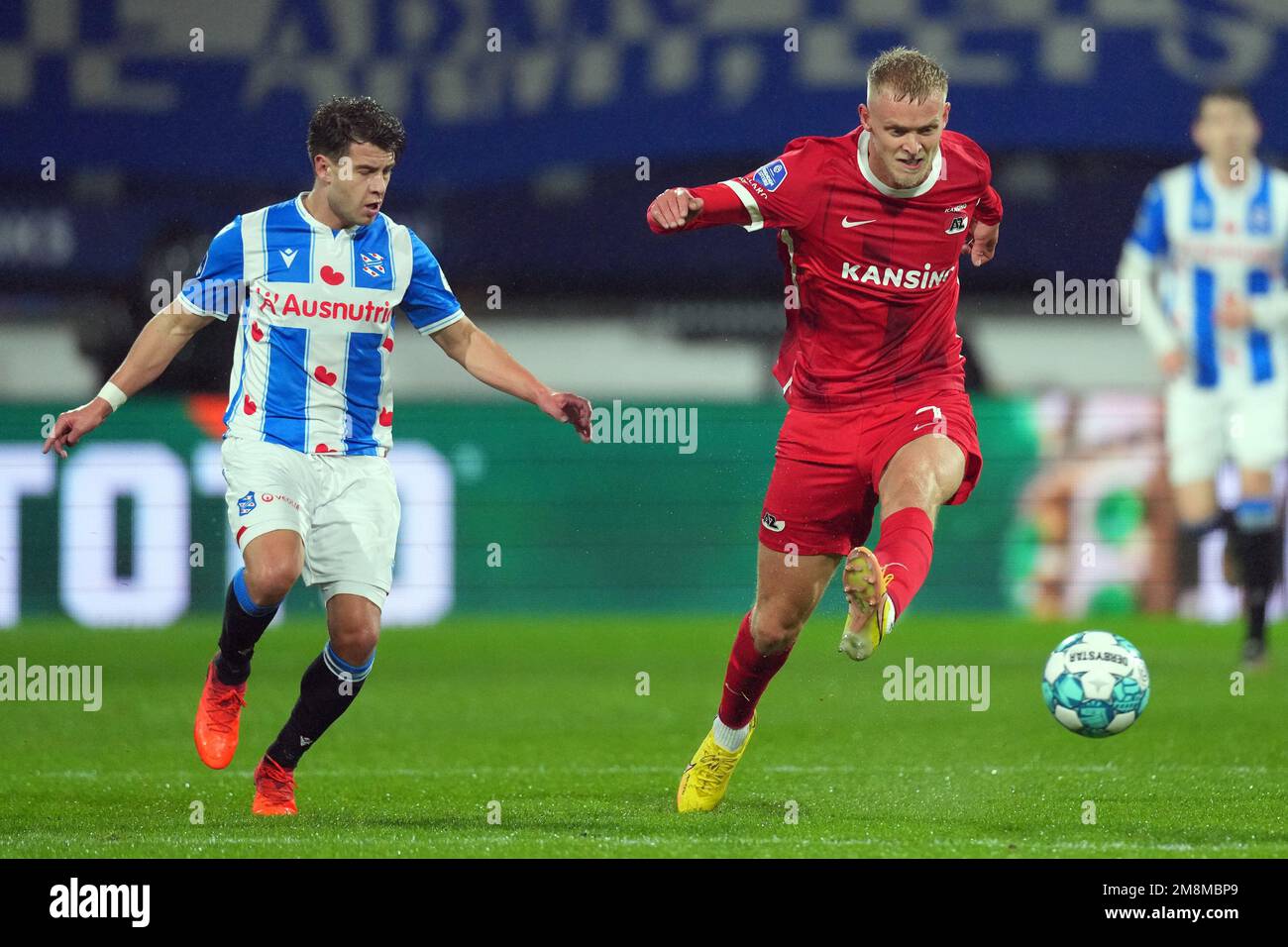 Netherlands. 14th Jan, 2023. HERENVEEN - (lr) Mats Kohlert of SC Heerenveen, Jens Odgaard of AZ ...