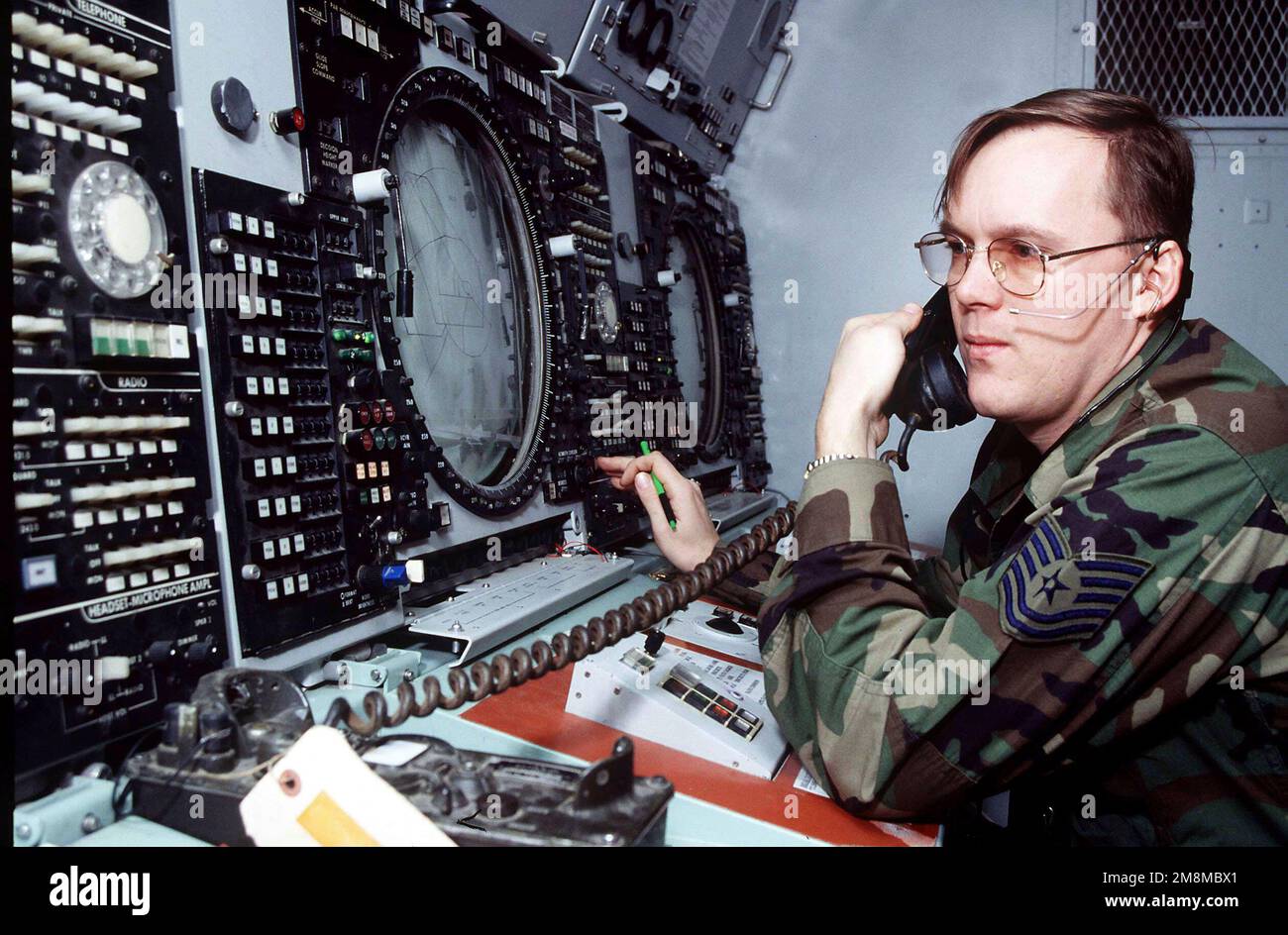 TSGT Dennis Boggs (USAF), 33rd Combat Communications Squadron, monitors ...