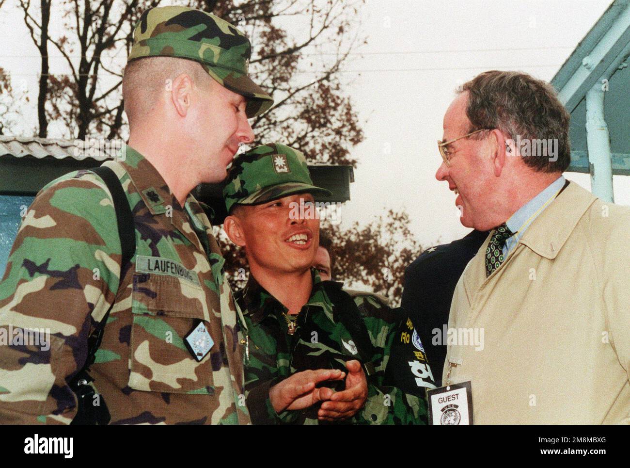 Deputy Secretary of Defense John P. White chats with LT. COL. James F ...