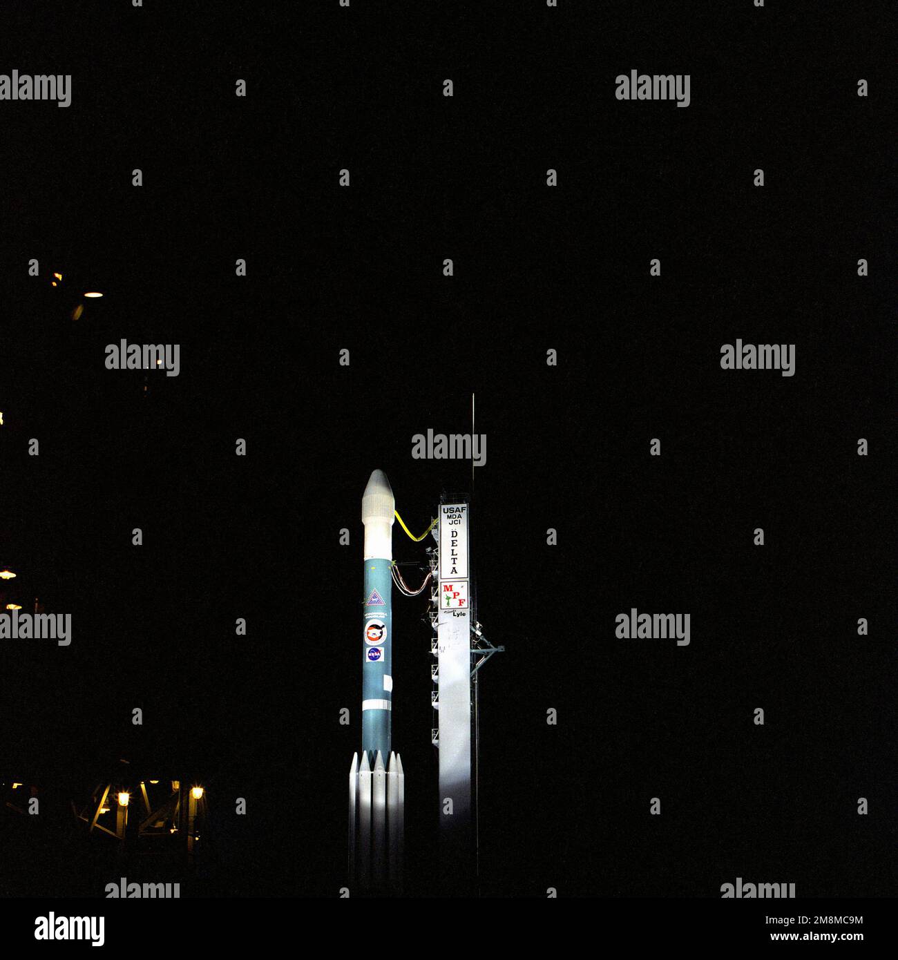 A McDonnell Douglas DELTA II Space Launch Vehicle sits poised on ...
