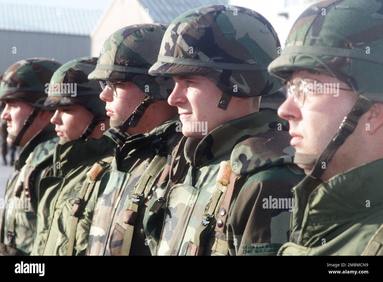 Builder Constructionman (BUCN) Doug Wagnor (center) of Naval Mobile ...