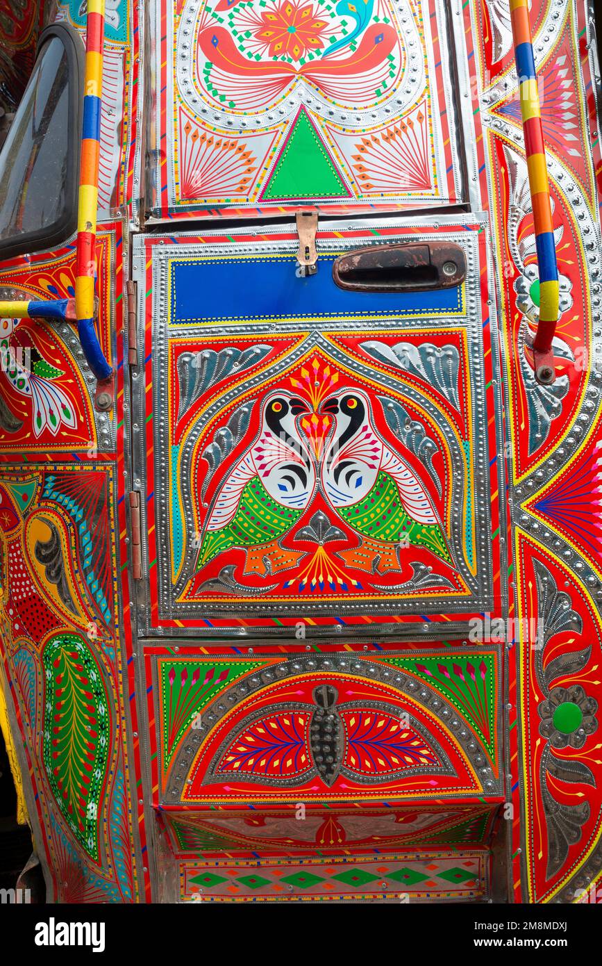Detail of a colorfully painted truck at the workshop, Peshawar ...