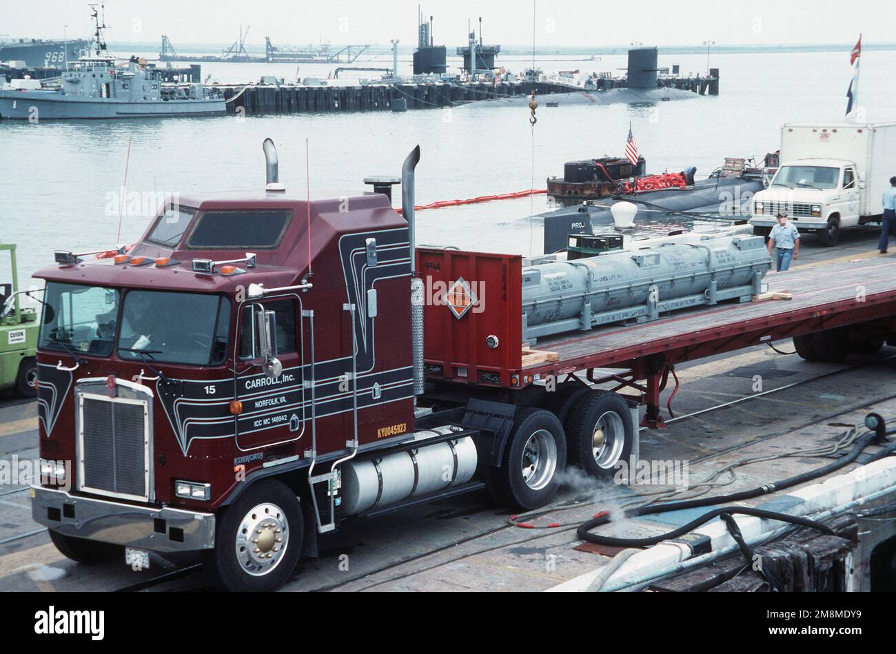 A civilian truck is backed out on one of the destroyer and submarine (D ...