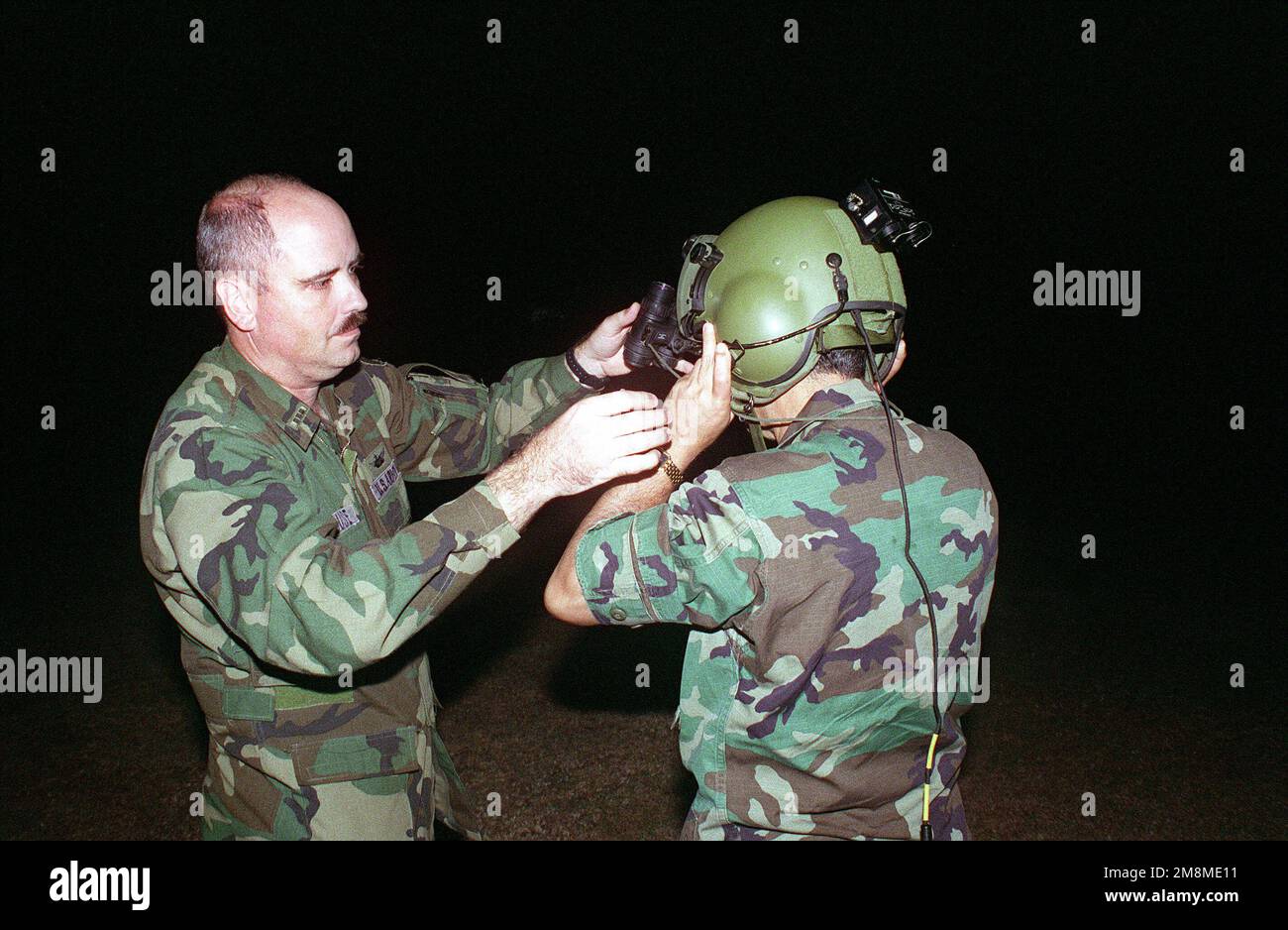 Major General Duran of the Ecuadorian Army, gets fitted with a flight ...