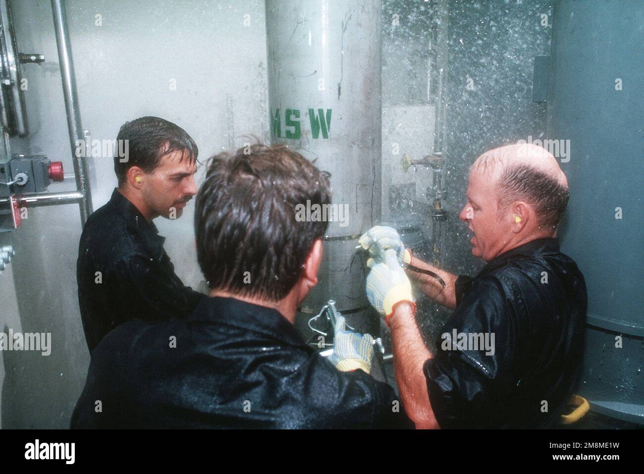 Submariners at the Groton Sub Base struggle to isolate a major leak in ...