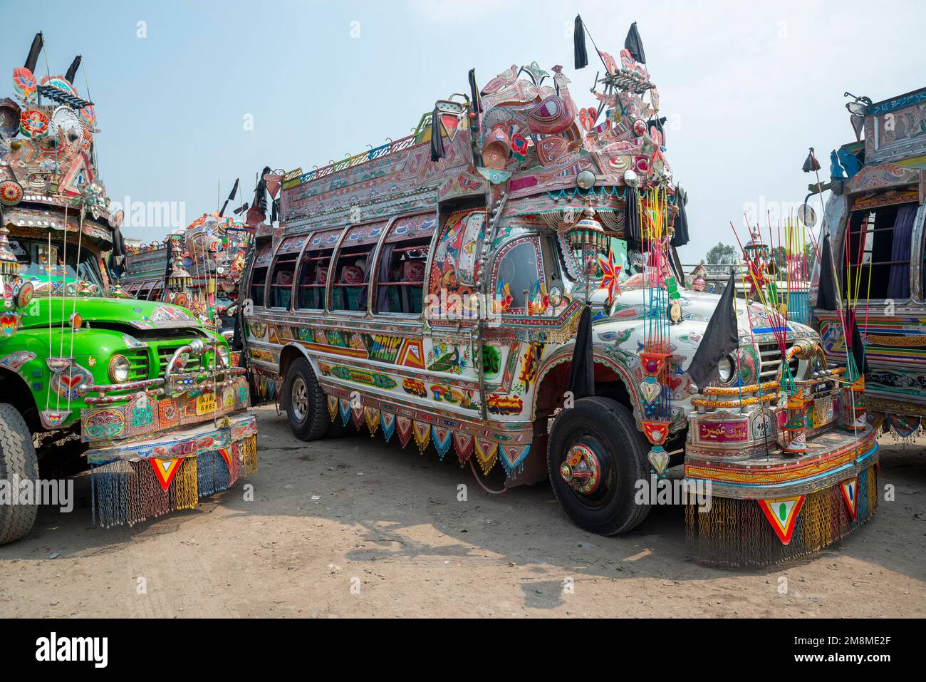 Colorfully painted buses at a bus station, Peshawar, Pakistan Stock ...