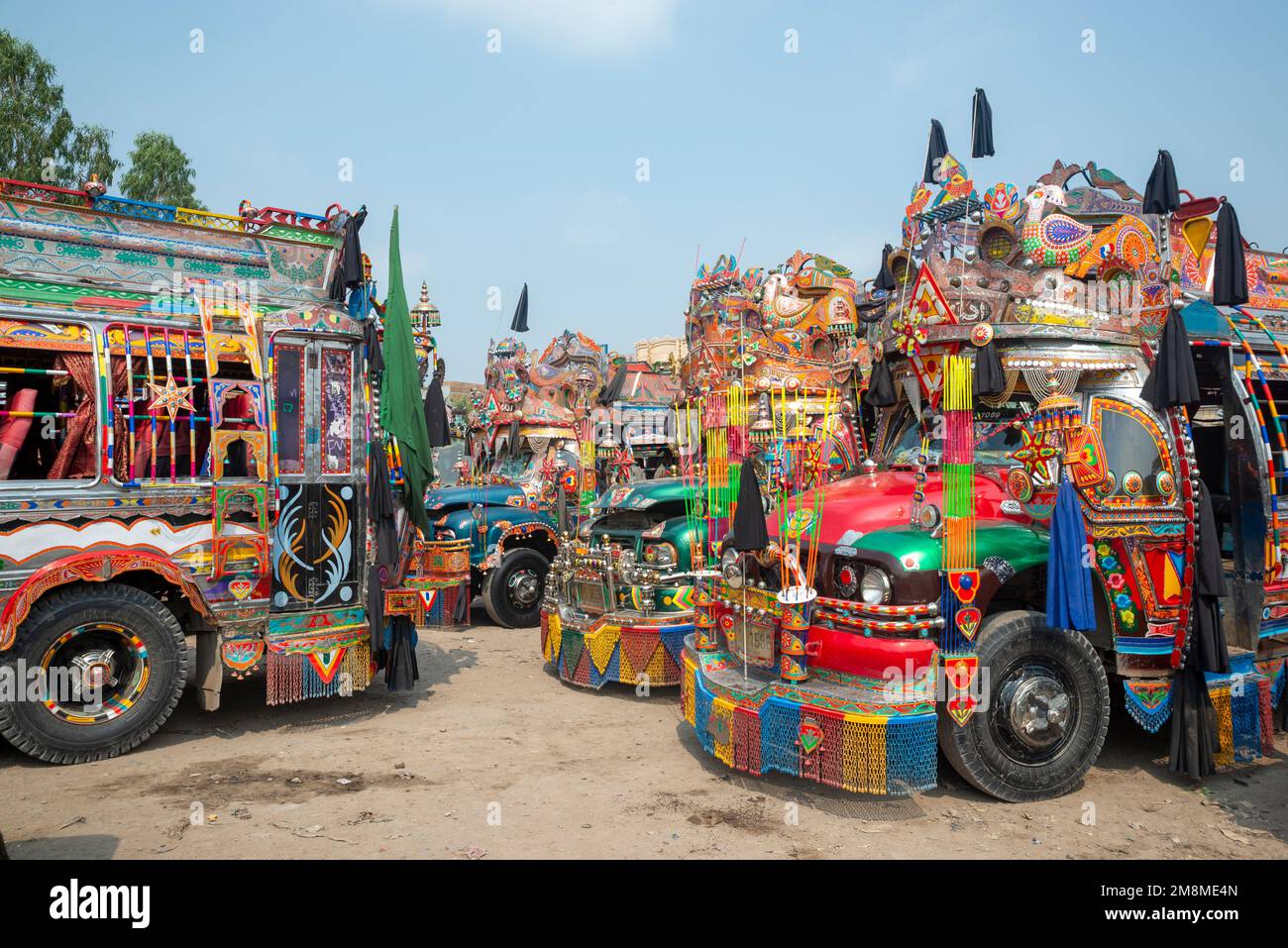 Colorfully painted buses at a bus station, Peshawar, Pakistan Stock ...