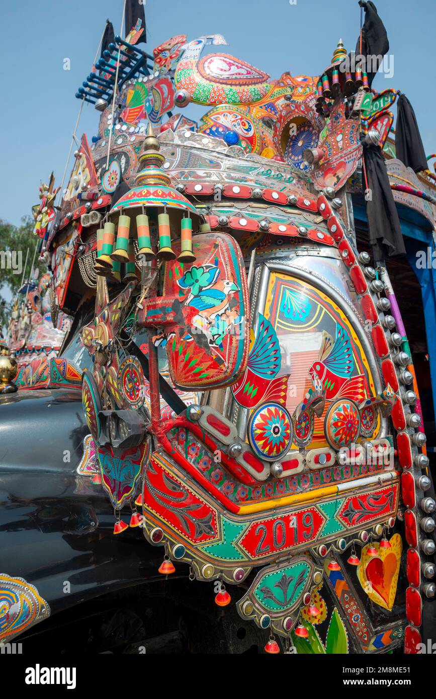 Detail of front decorations of a colorfully painted bus, Peshawar ...