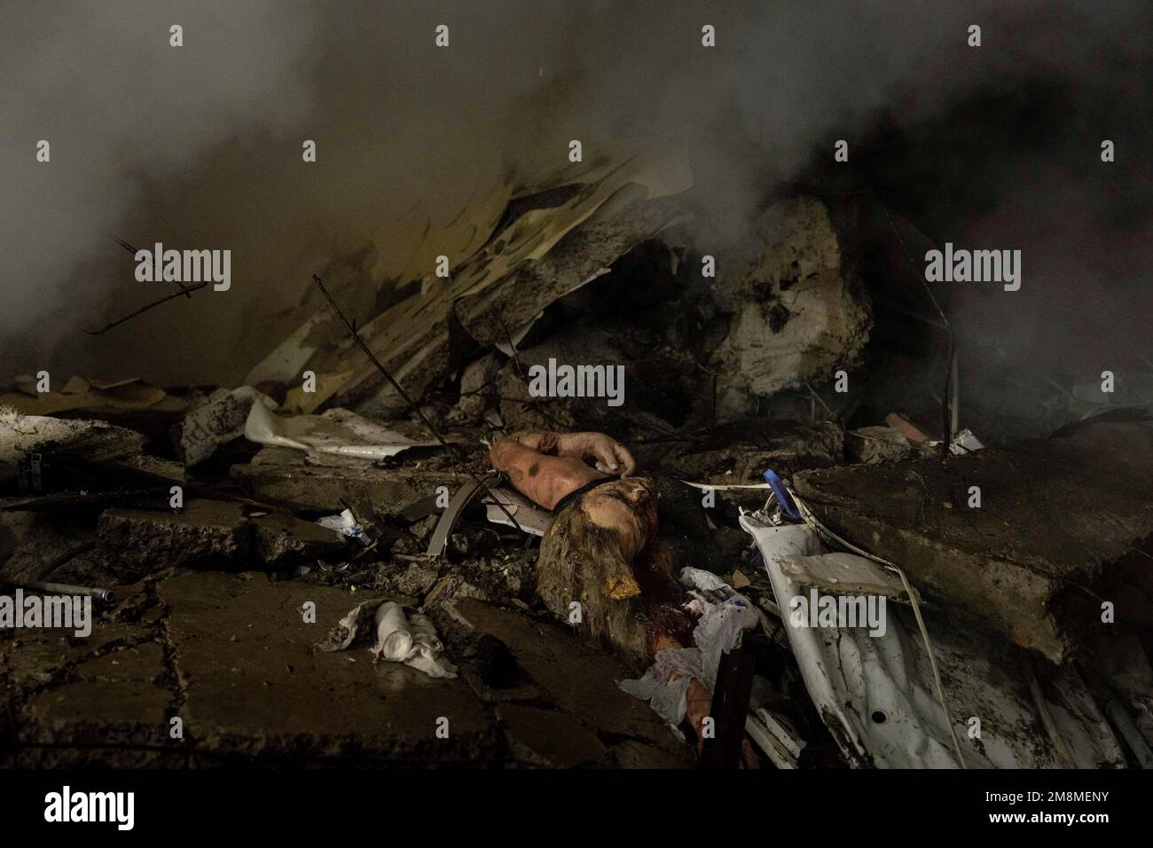 EDS NOTE: GRAPHIC CONTENT - The body of a woman who was killed in a ...