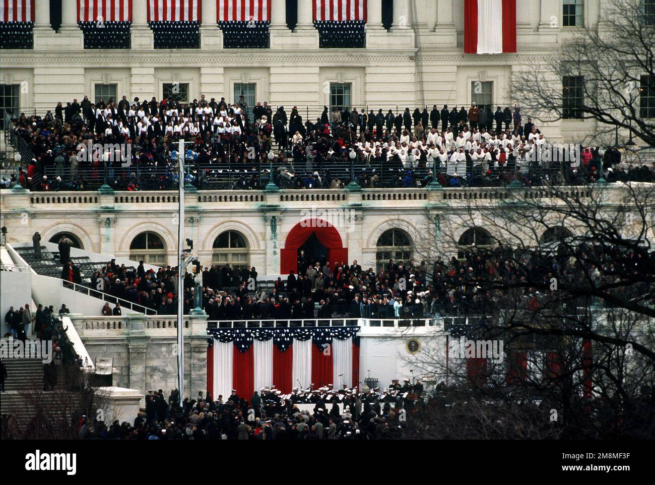 A medium shot wide angel view of the crowds lining the balconies of the ...
