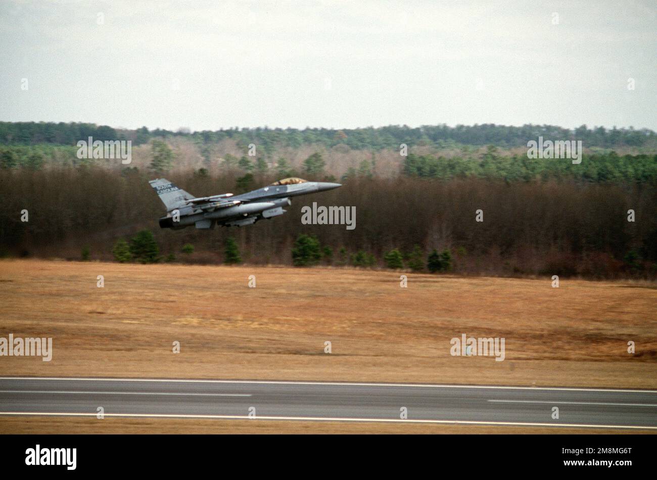 An F-16C Falcon armed with AIM-120 AMRAAM missiles takes off to ...