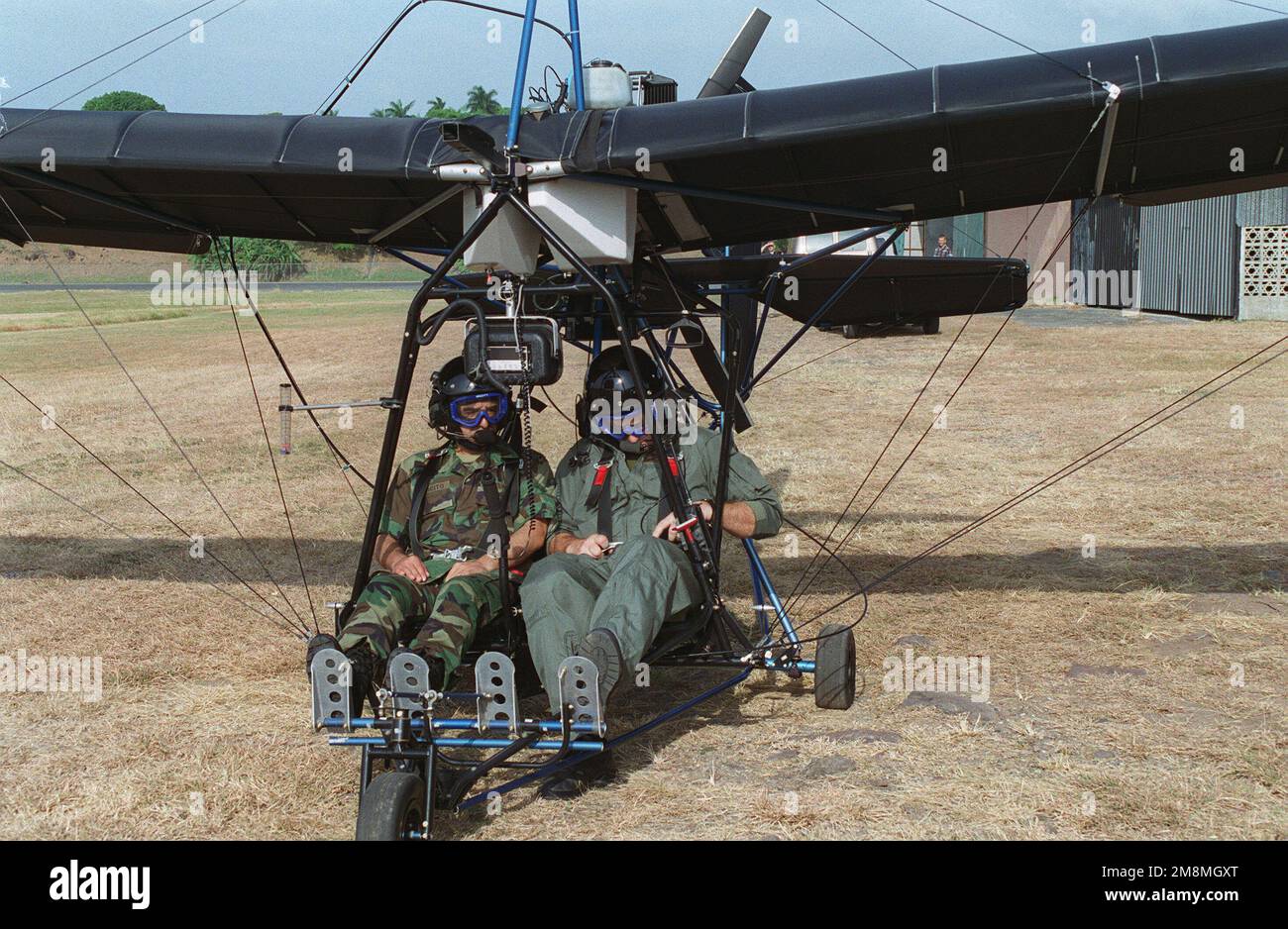 GEN Duran of the Ecuador Army prepares for a flight on an ultra-light ...