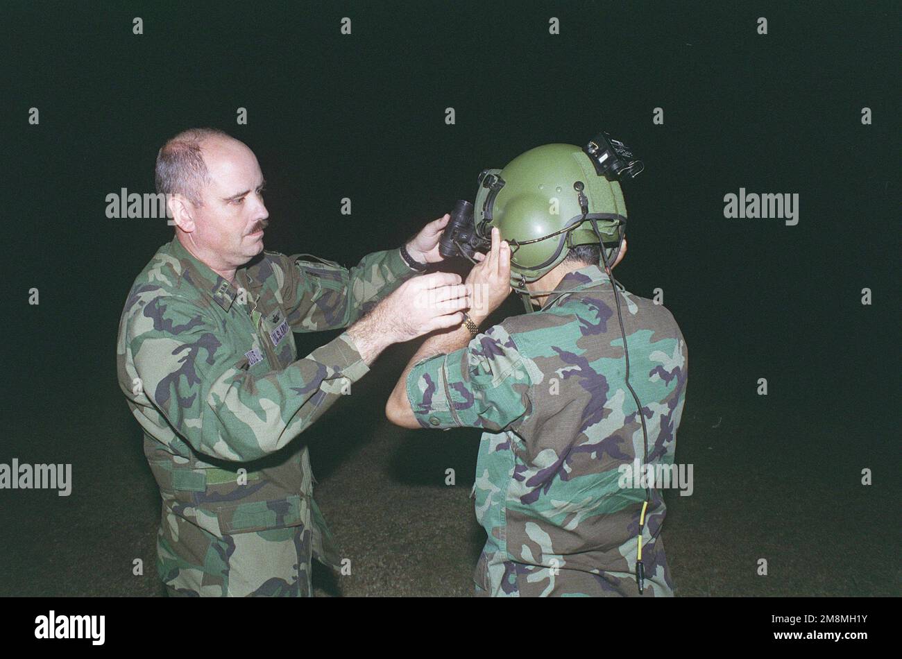 GEN Duran, Ecuador Army, is fitted with a flight helmet that has night ...