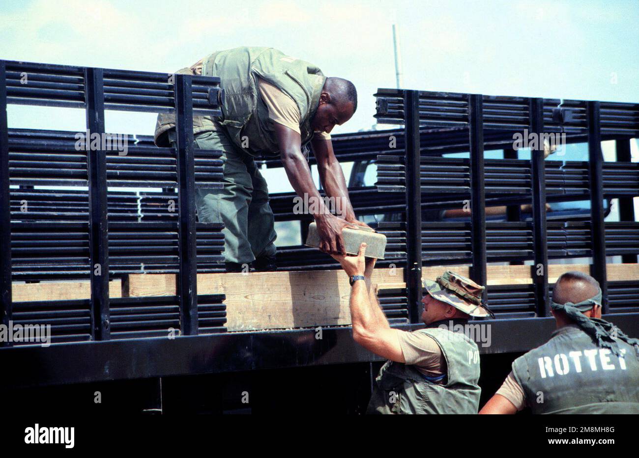 Marine Barracks Minefield Maintenance personnel unload deactivated anti ...