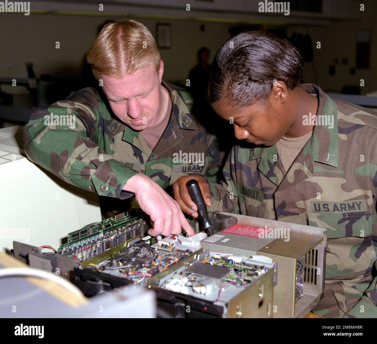 STAFF SGT. Saulsbury is showing PFC. Bradley how to replace a Power ...