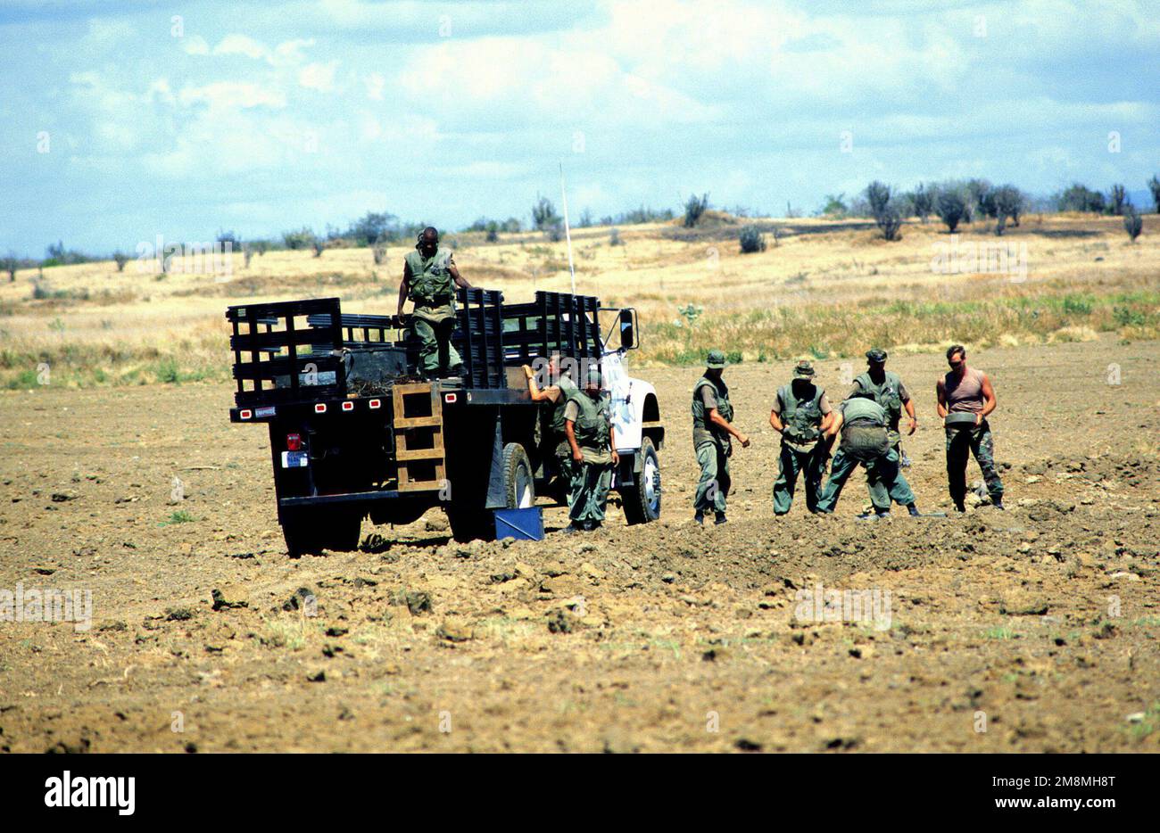 Marine Barracks Minefield Maintenance personnel unload deactivated anti ...