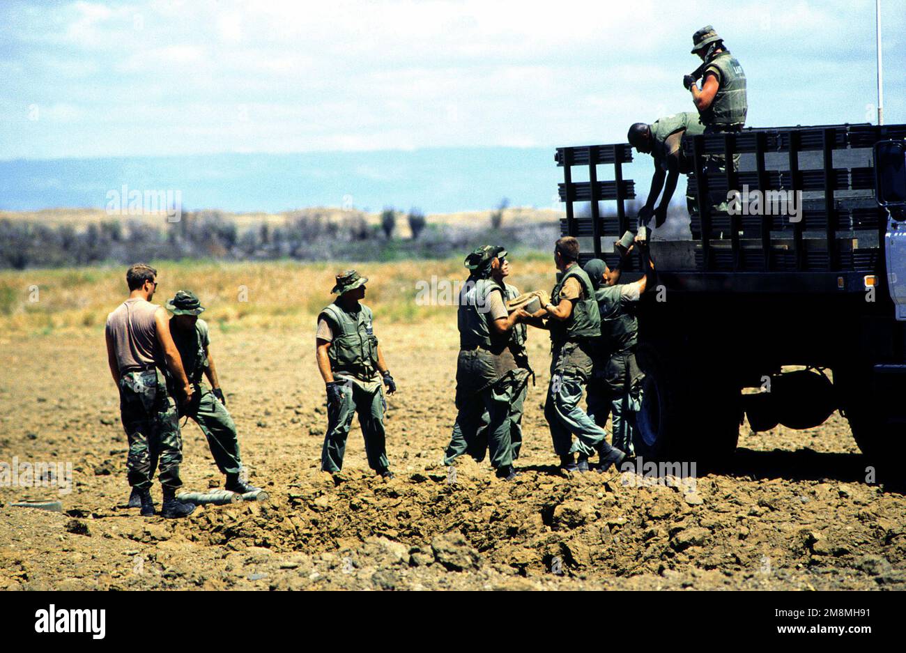 Marine Barracks Minefield Maintenance personnel unload deactivated anti ...