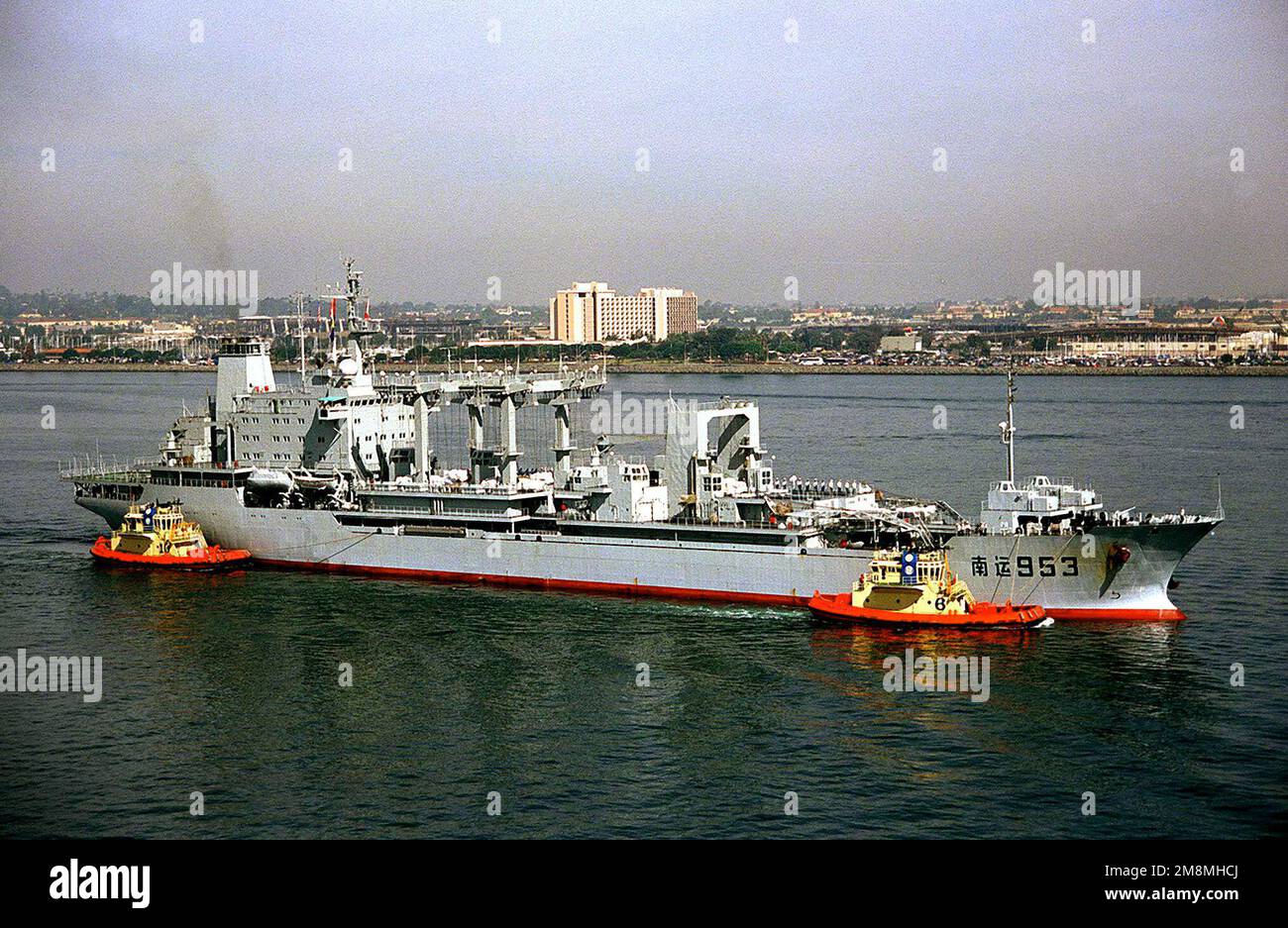 Chinese sailors man the decks of the Chinese supply ship, the Fusu ...