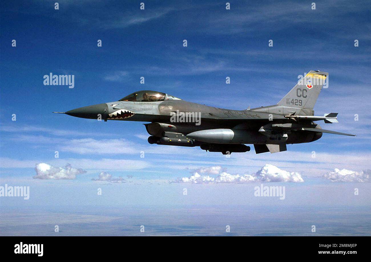 Aerial view of an F-16 Fighting Falcon from the 542nd Fighter Squadron ...