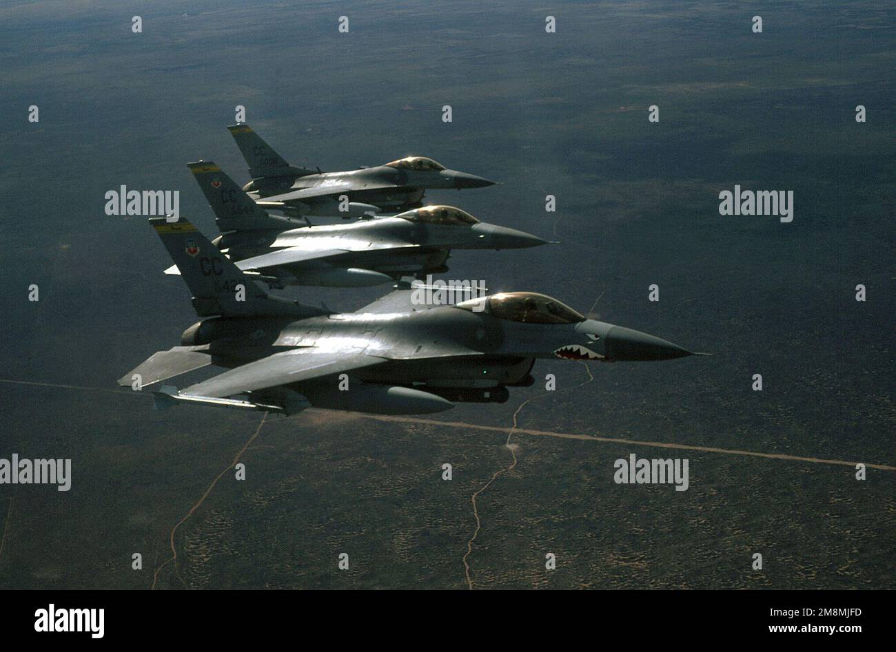 Aerial view of a formation of three F-16 Fighting Falcons from the ...
