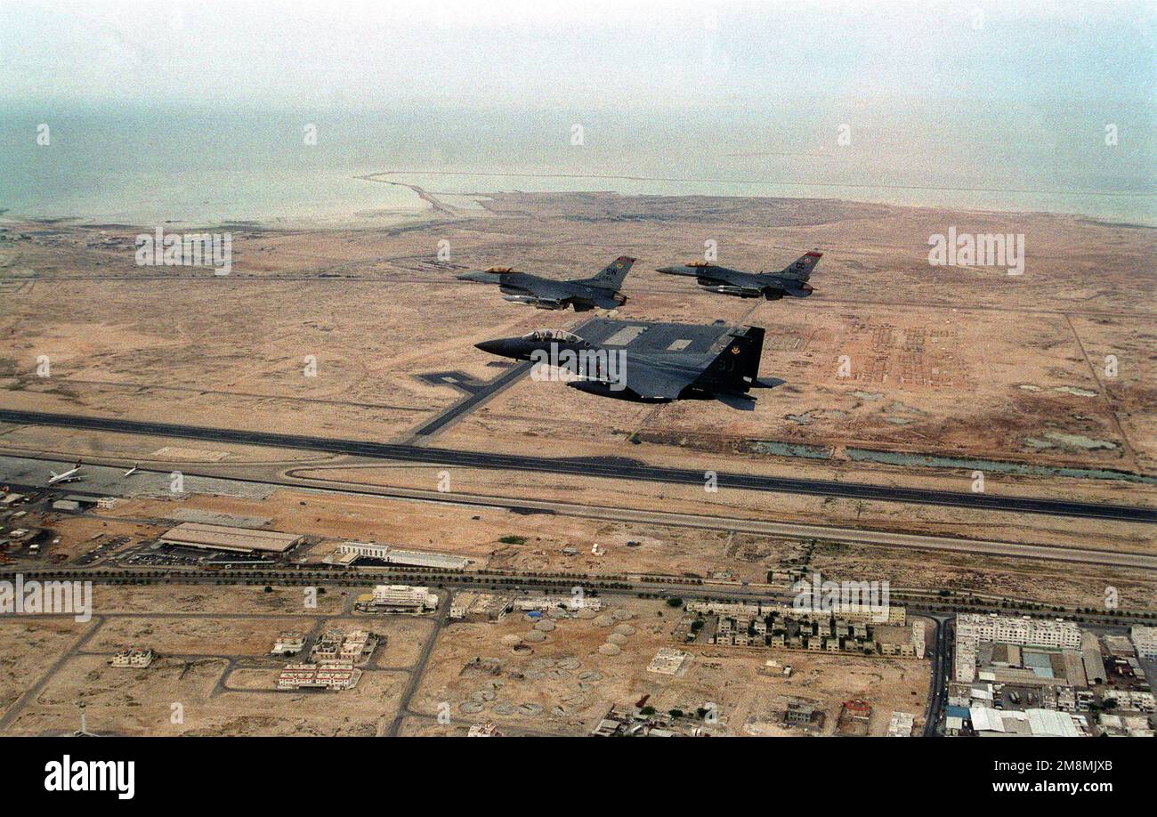 Air to air view as three aircraft of the 4th Air Expeditionary Wing fly ...