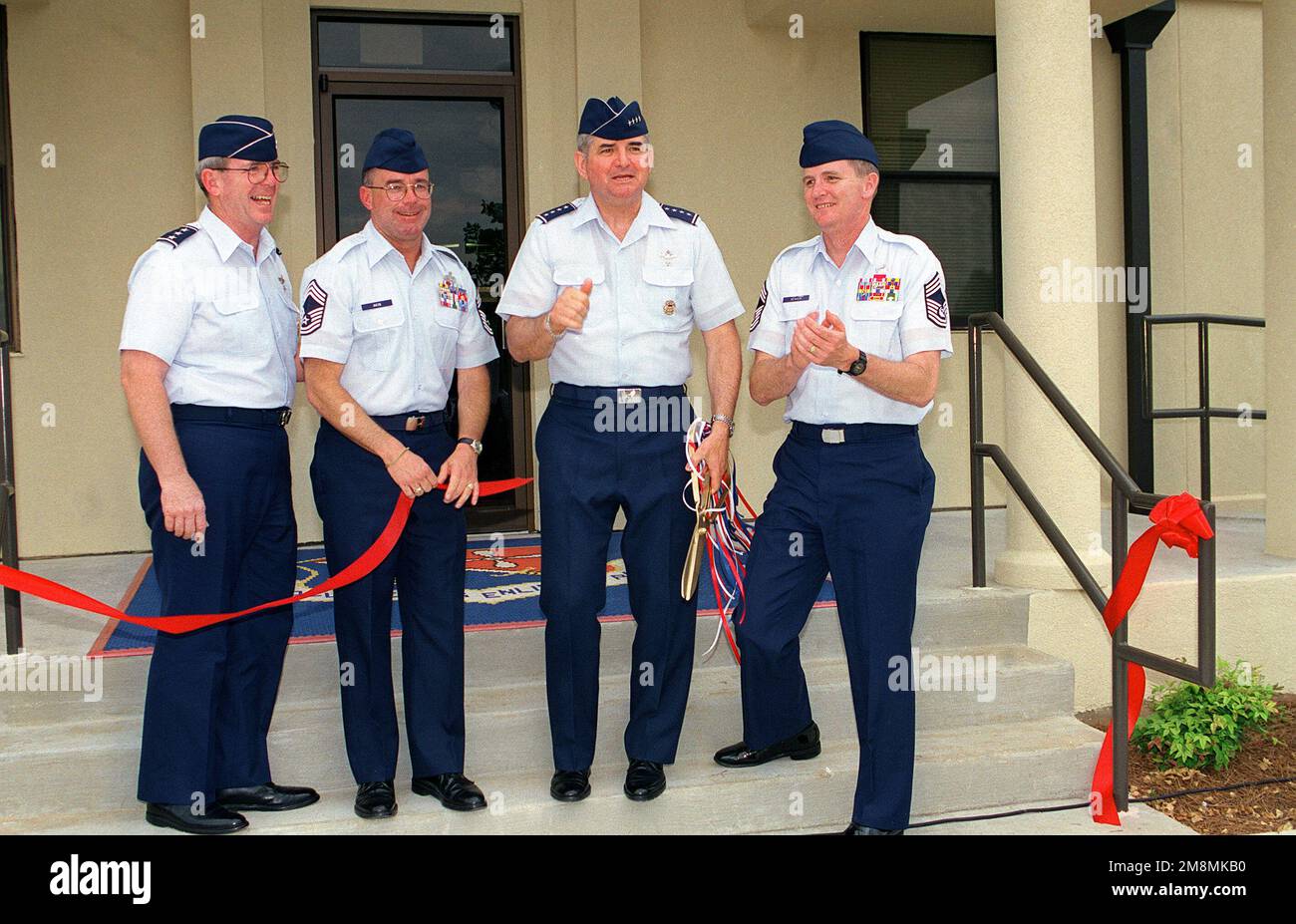 Participants stand on the steps of Enlisted Heritage Hall after the ...
