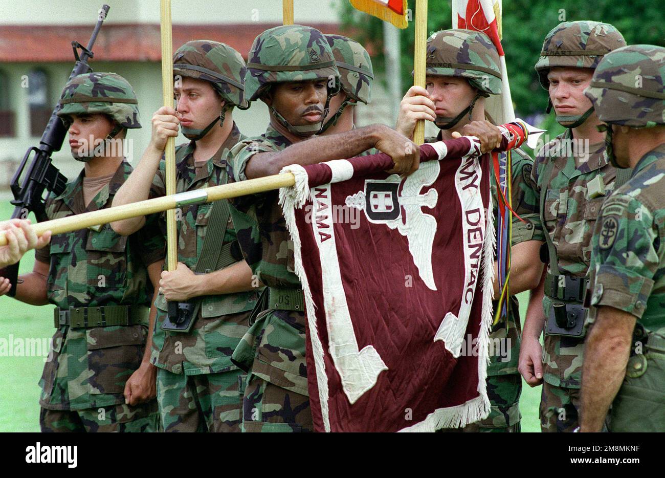 MASTER SGT. Pantoja rolls up the flag during the MEDDAC/DENTAC ...